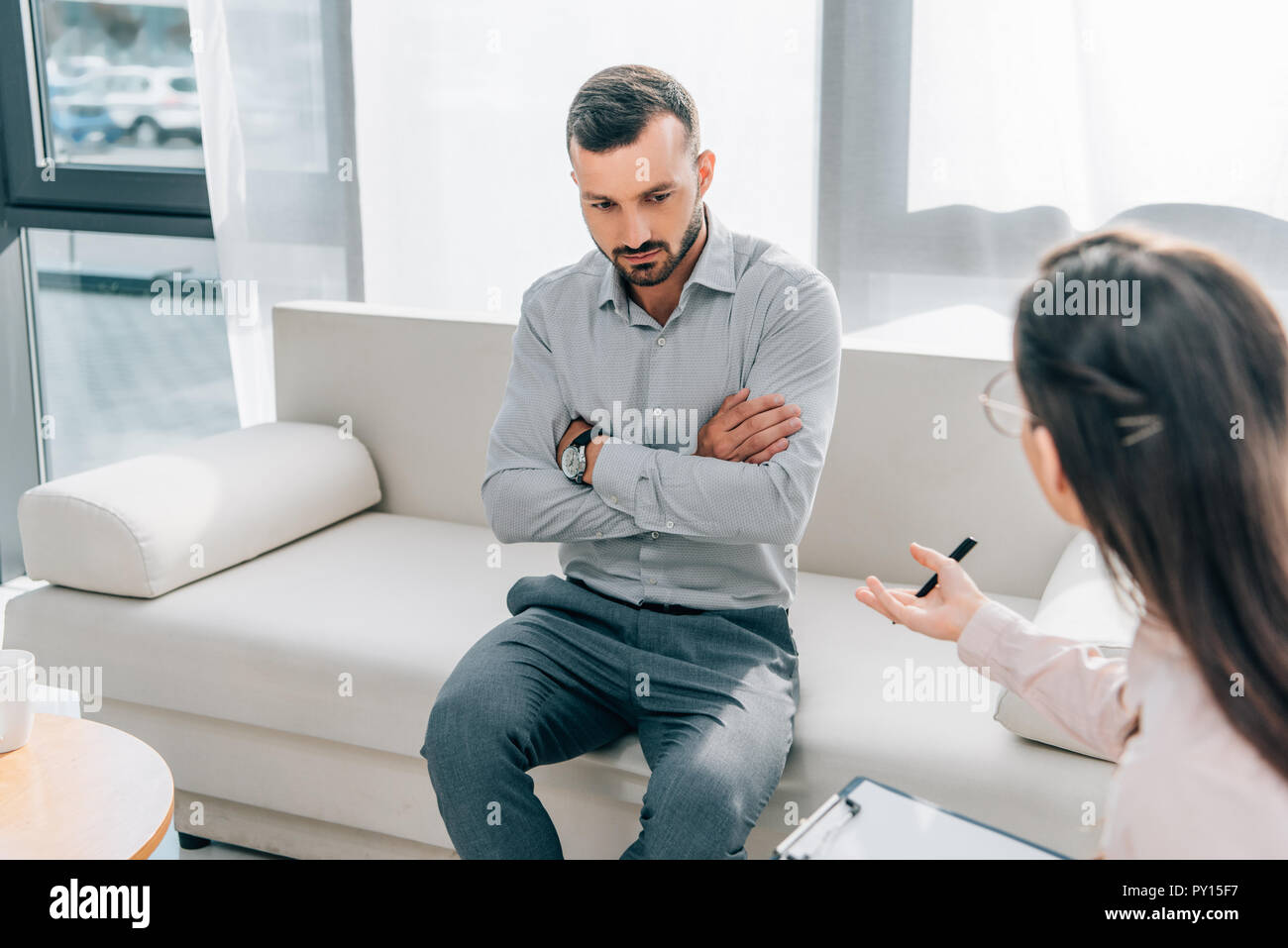 psychologist and patient talking in clinic, mental health concept Stock ...