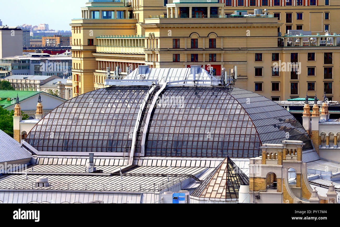 Top of the huge building in the shape of dome from glass and metal ...