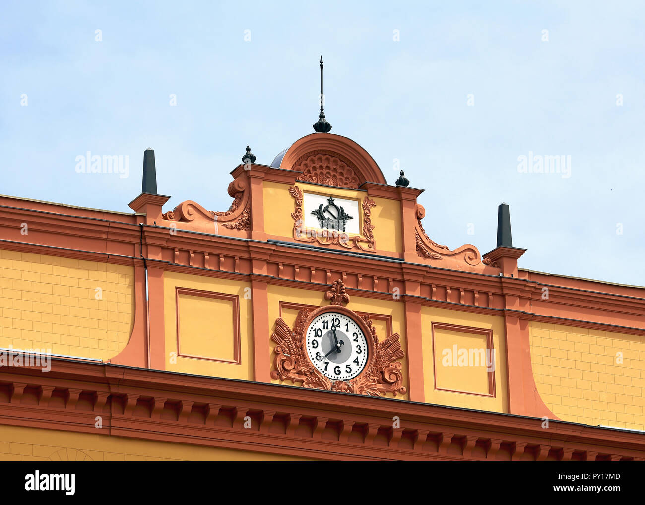 Yellow buildings wall with the soviet symbolics Stock Photo - Alamy