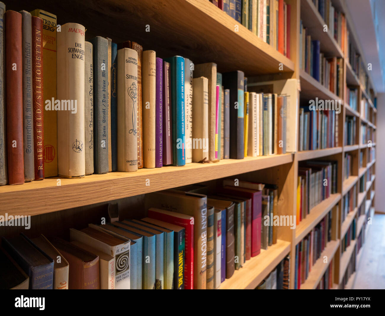 Image of wooden book shelf with books in library Stock Photo - Alamy