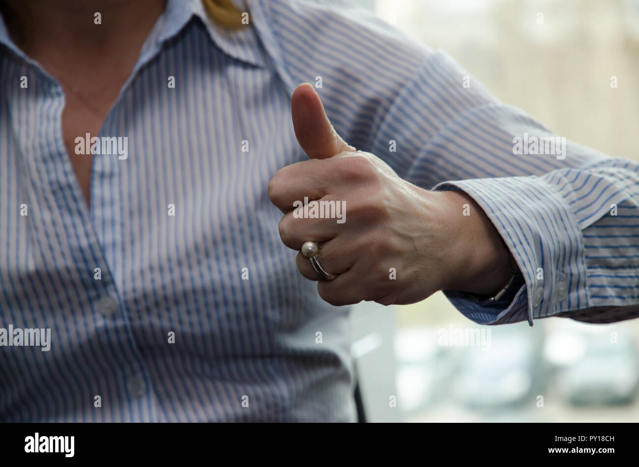 anonymous faceless person with yes gesture Stock Photo - Alamy