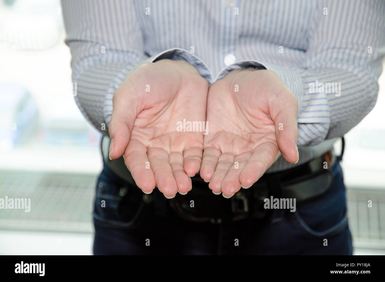 anonymous faceless person with open empty hands Stock Photo - Alamy