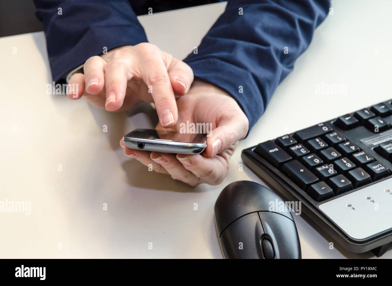 hands and mobile, mouse and keyboard Stock Photo - Alamy