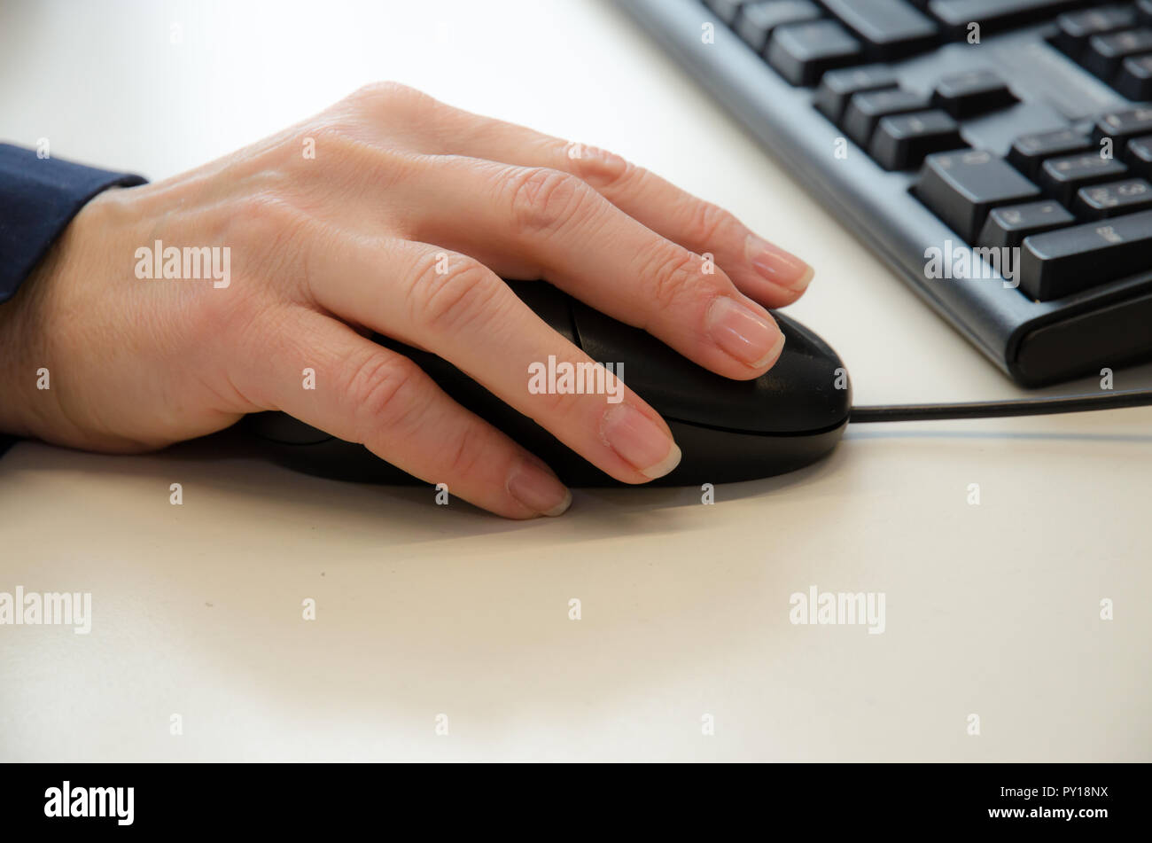 hands on mouse and keyboard Stock Photo - Alamy