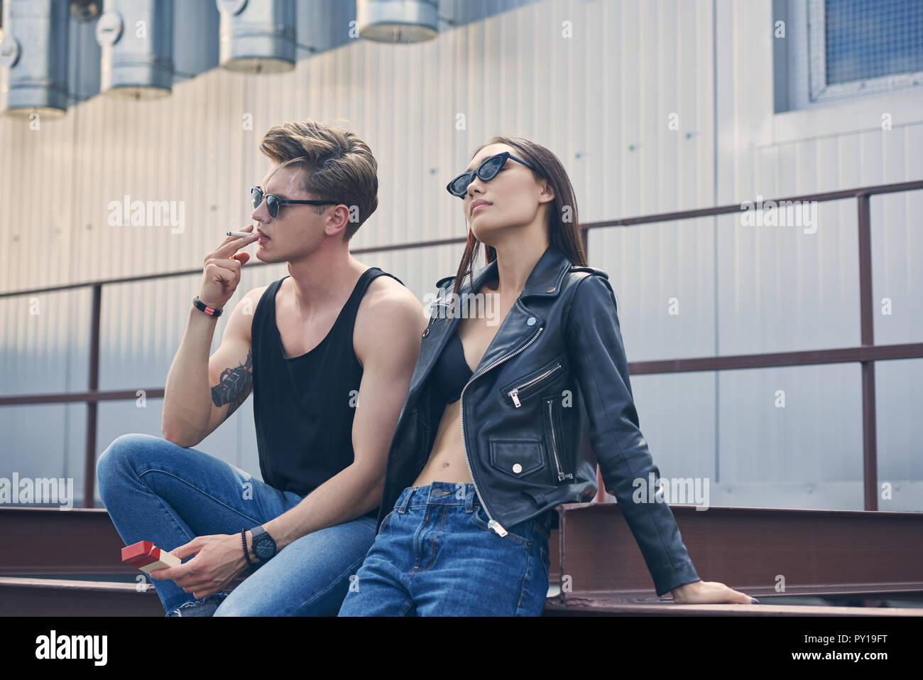 Young asian woman smoking cigarette hi-res stock photography and images ...