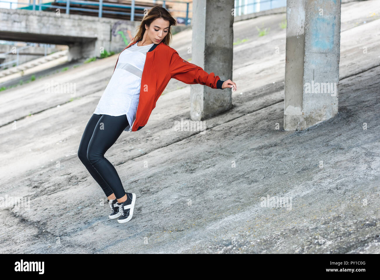 selective focus of young asian stylish female urban dancer dancing at ...