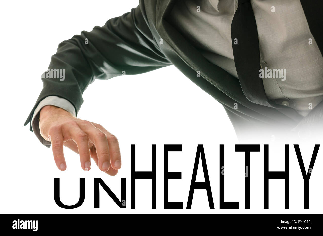 Changing word Unhealthy into Healthy by pushing away letters un Stock ...