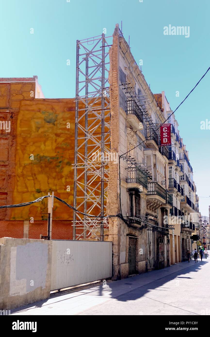 Cartagena, Spain - August 1 2018: The facade of once beautiful ornate ...