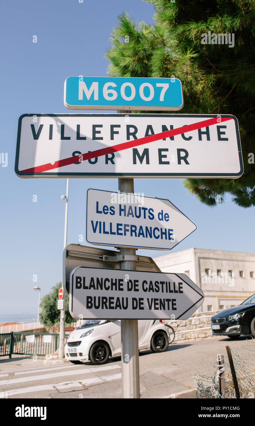 Road signs on the street of the southern European city Stock Photo - Alamy