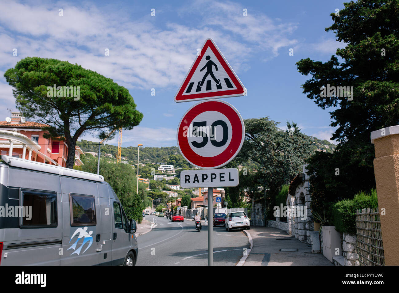 Road signs on the street of the southern European city Stock Photo - Alamy