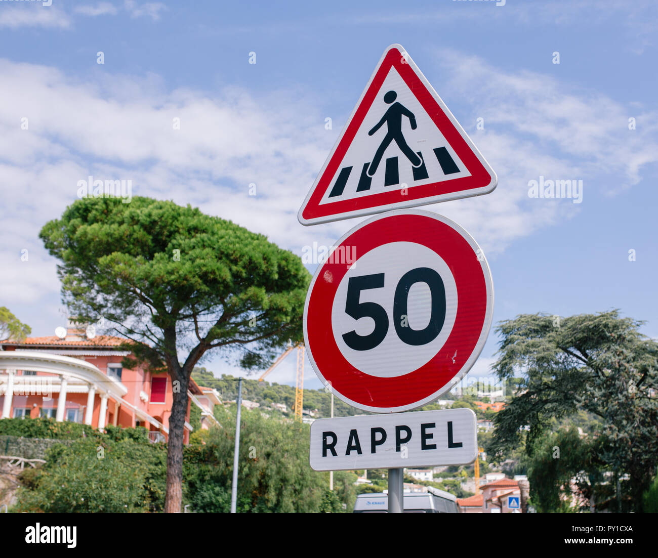 Road signs on the street of the southern European city Stock Photo - Alamy