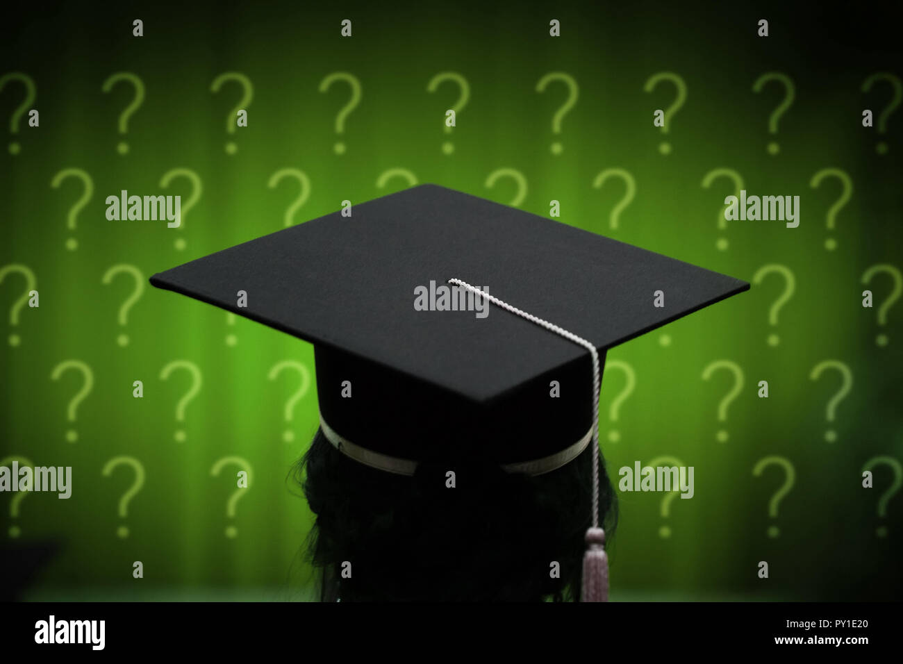 Graduate looking into the unknown future, concept image Stock Photo - Alamy