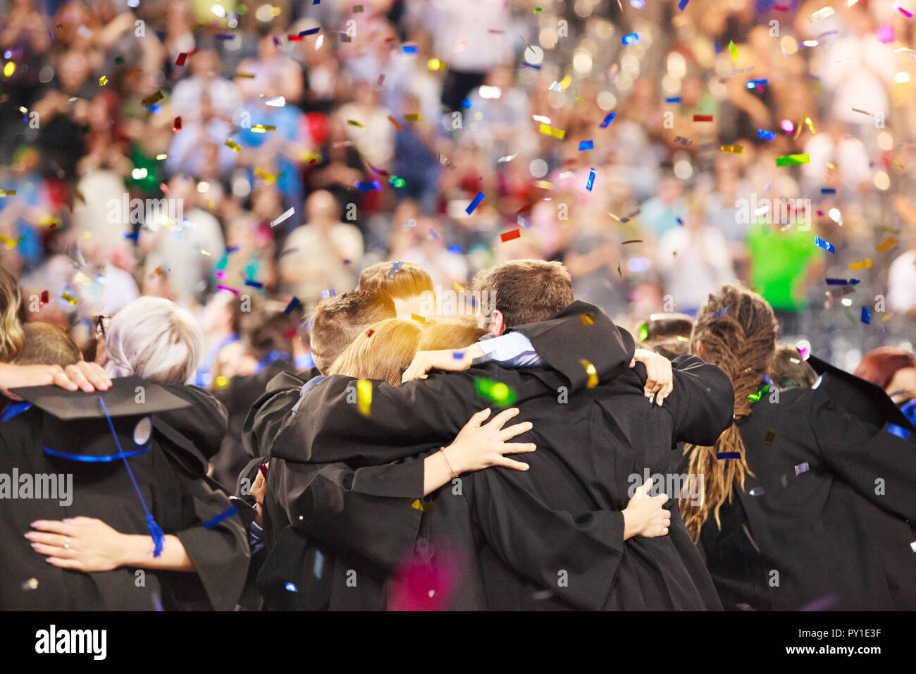 Cheerful students celebrating graduation ceremony hi-res stock ...