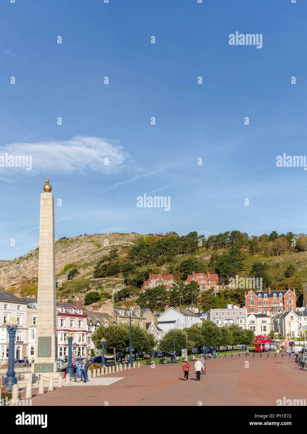 The promenade at Llandudno, North Wales. The Cenotaph is on one side ...