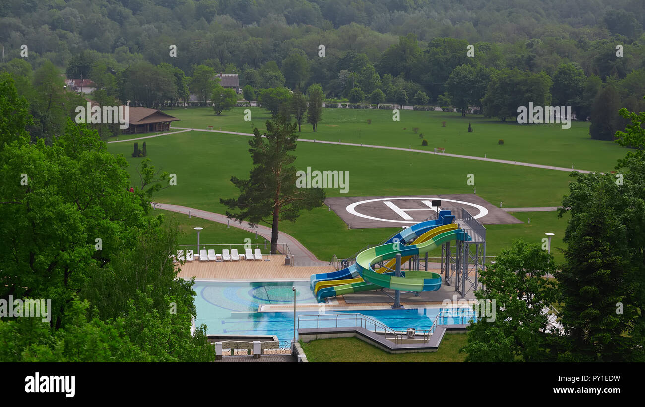 swimming pool on luxury resort in forest Stock Photo - Alamy