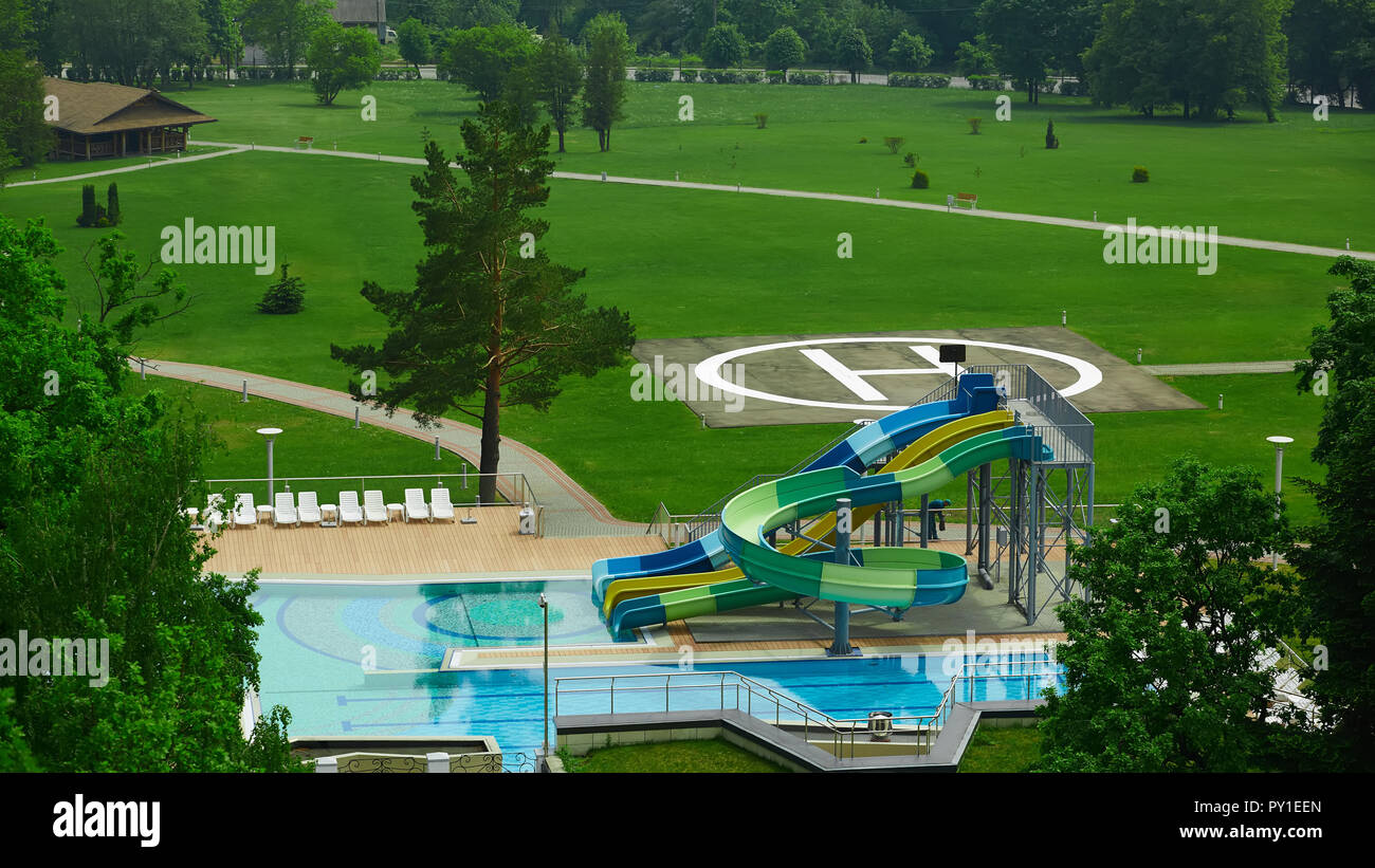 swimming pool on luxury resort in forest Stock Photo - Alamy