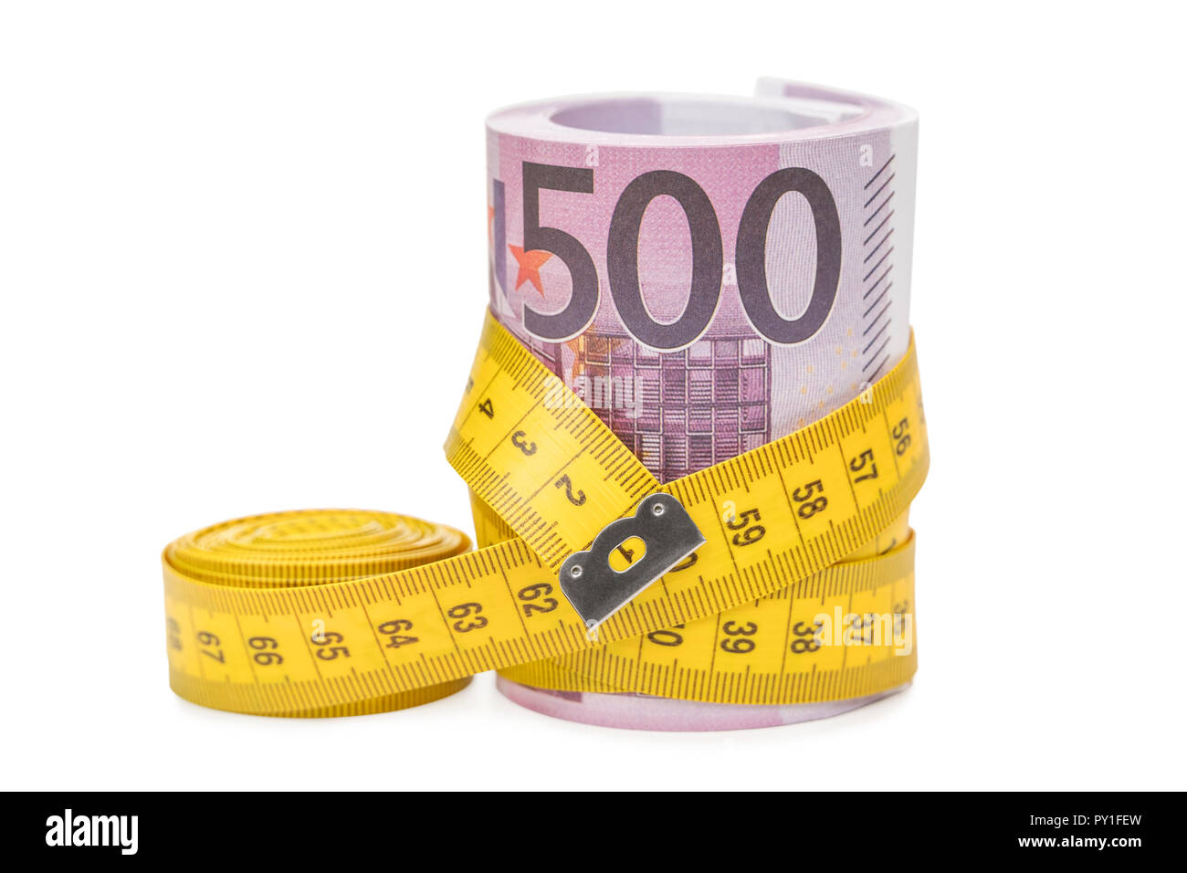 Money wrapped in measuring tape Stock Photo - Alamy