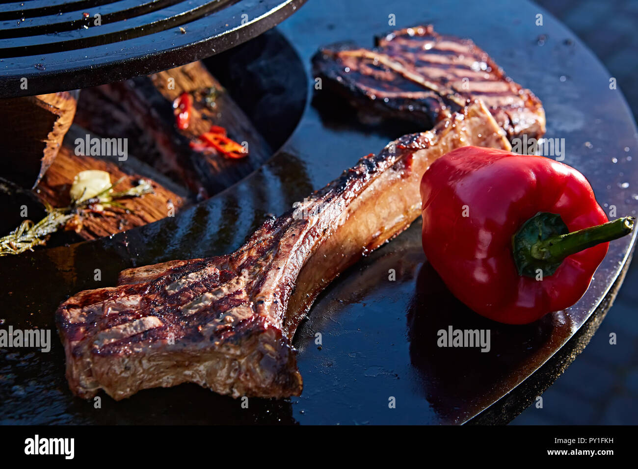 beautifully seared tomahawk steak, medium rare to rare Stock Photo - Alamy