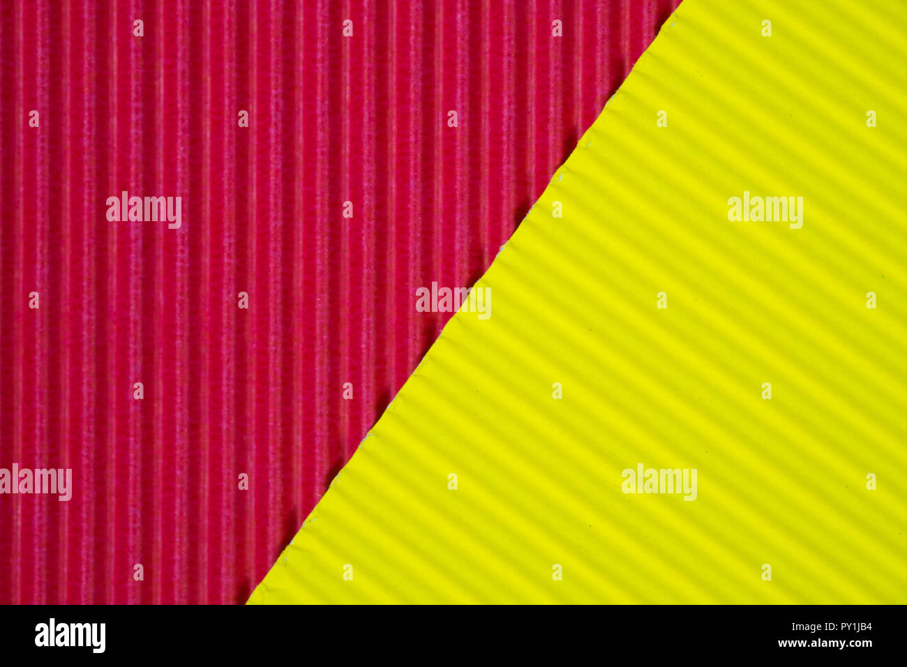 Red and yellow corrugated paper texture, use for background. vivid ...