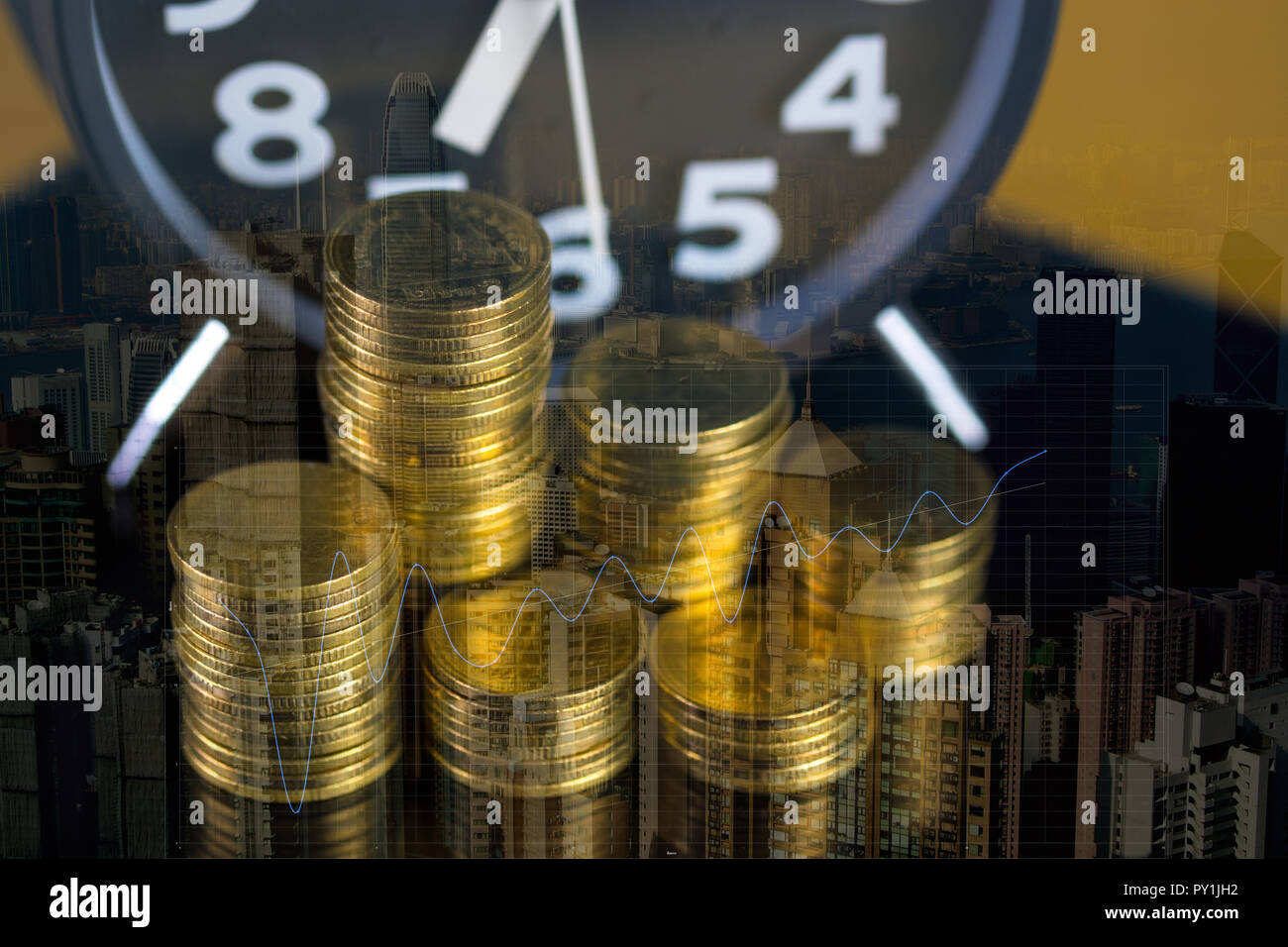 Coins stacks and alarm clock in dark room, business and finance concept ...