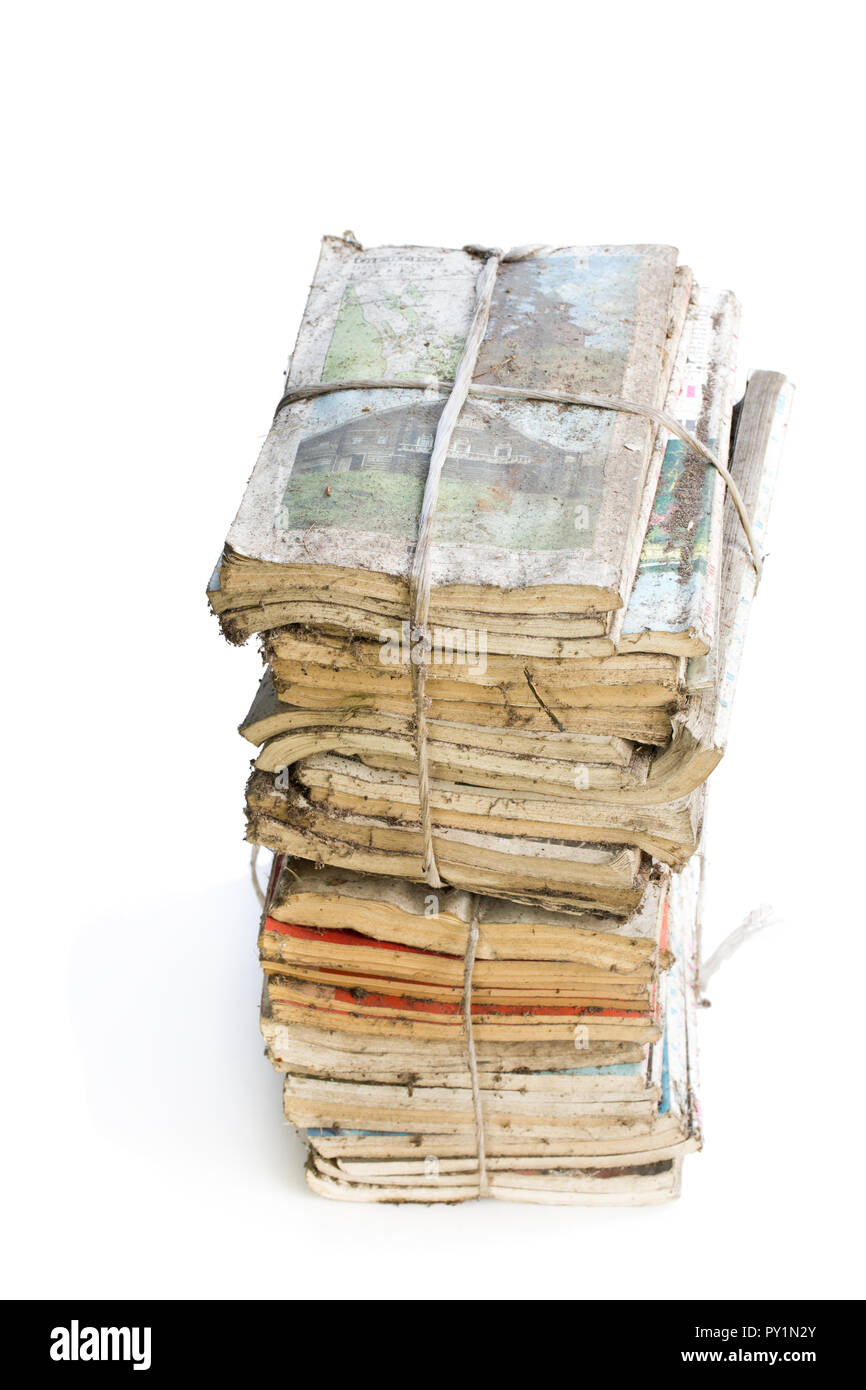 Stack of old and dusty magazines isolated on white Stock Photo - Alamy