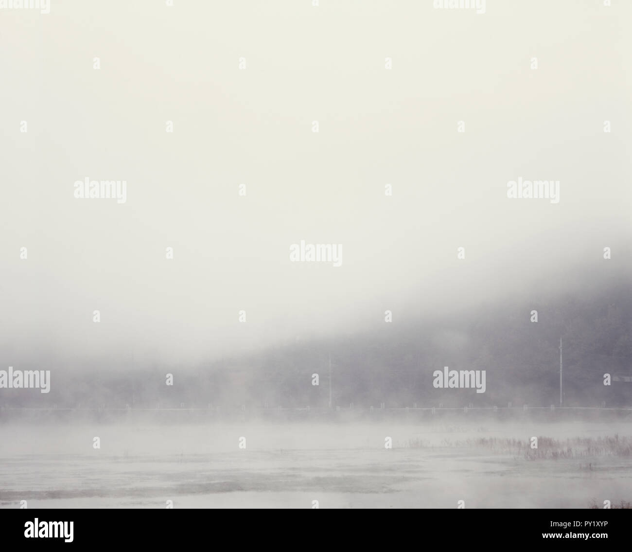 Fog rose from the reservoir in the morning, Chungcheong Province, South ...