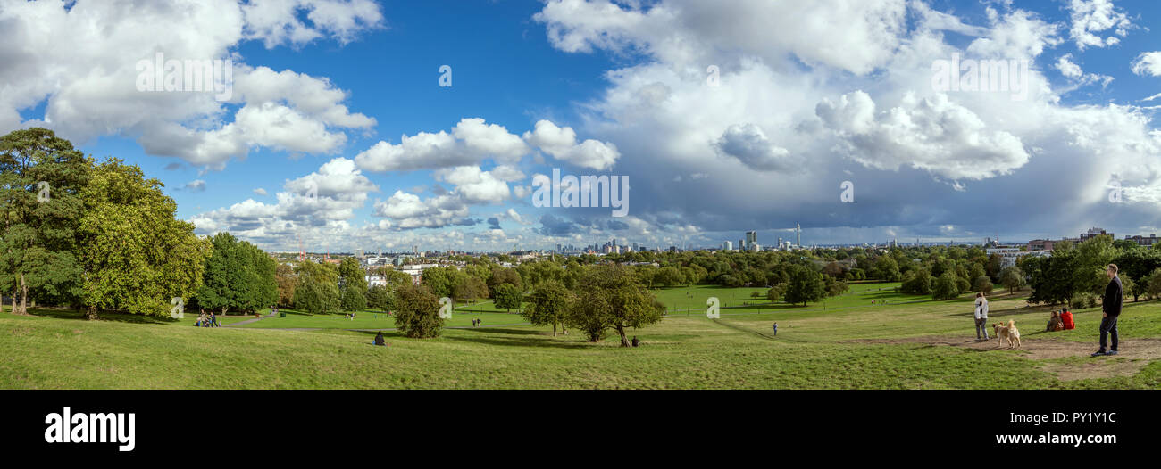 A walk in the Primrose Park during the day. Panoramic view of London ...
