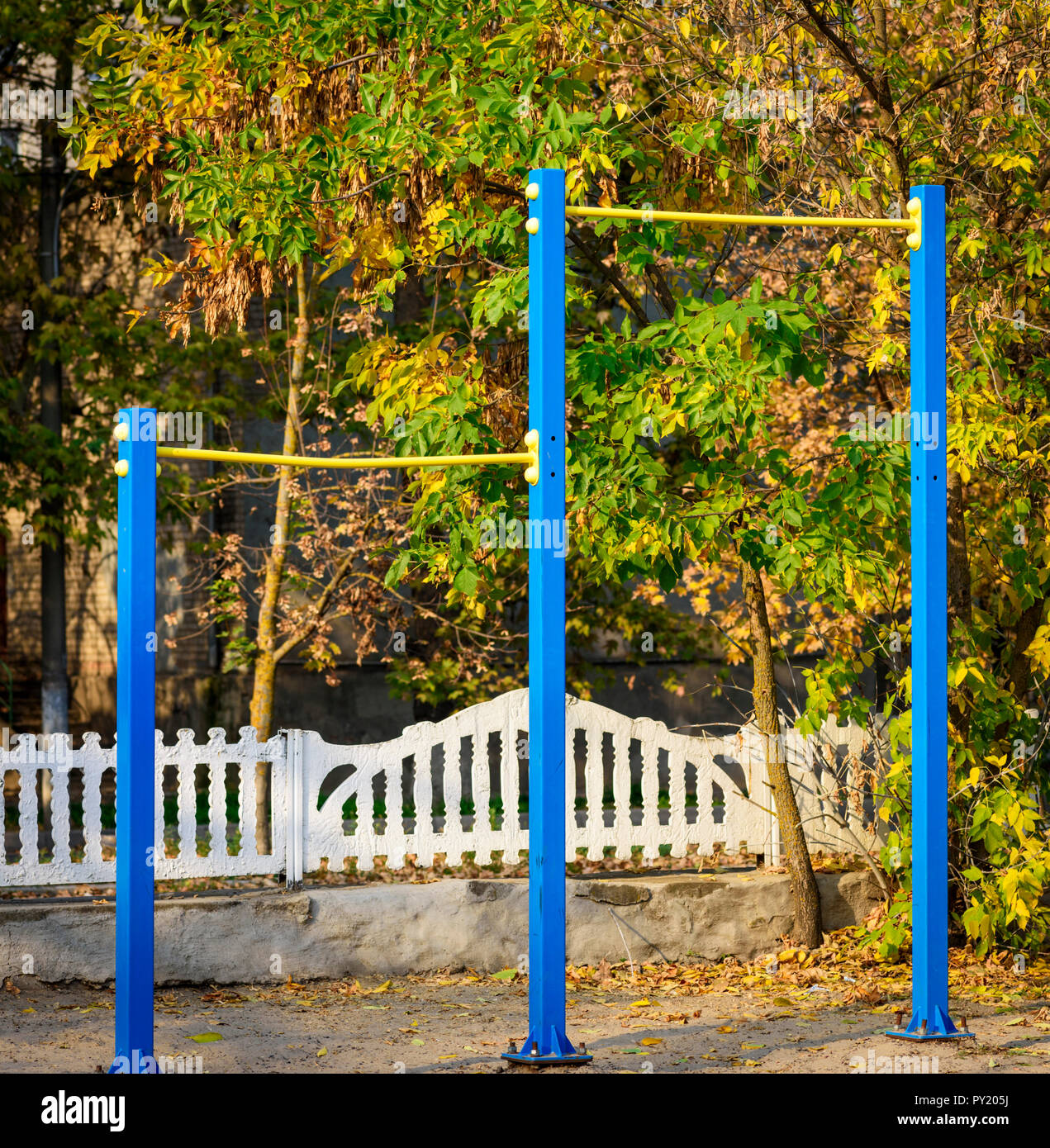 iron crossbar on the cityâ€™s sports ground on an autumn afternoon ...
