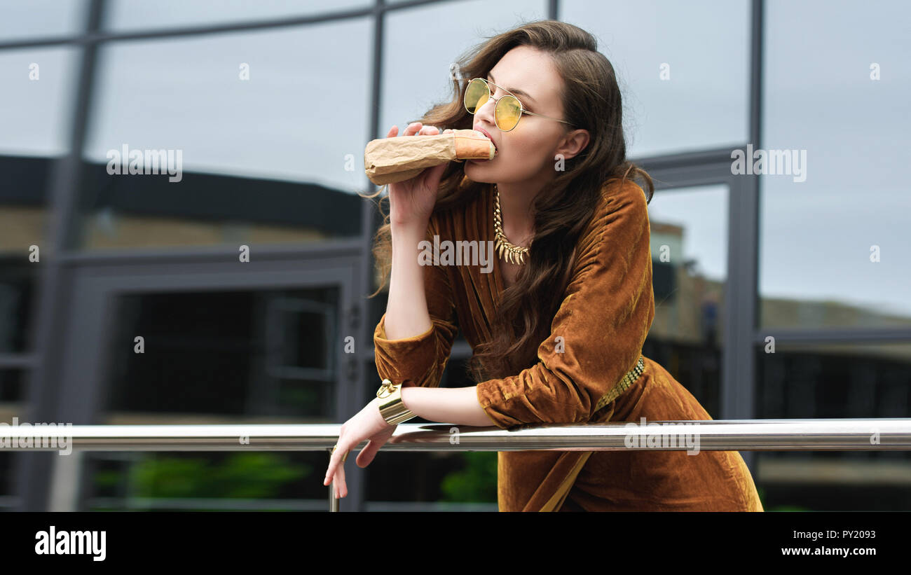 Portrait woman eating hot dog hi-res stock photography and images - Alamy