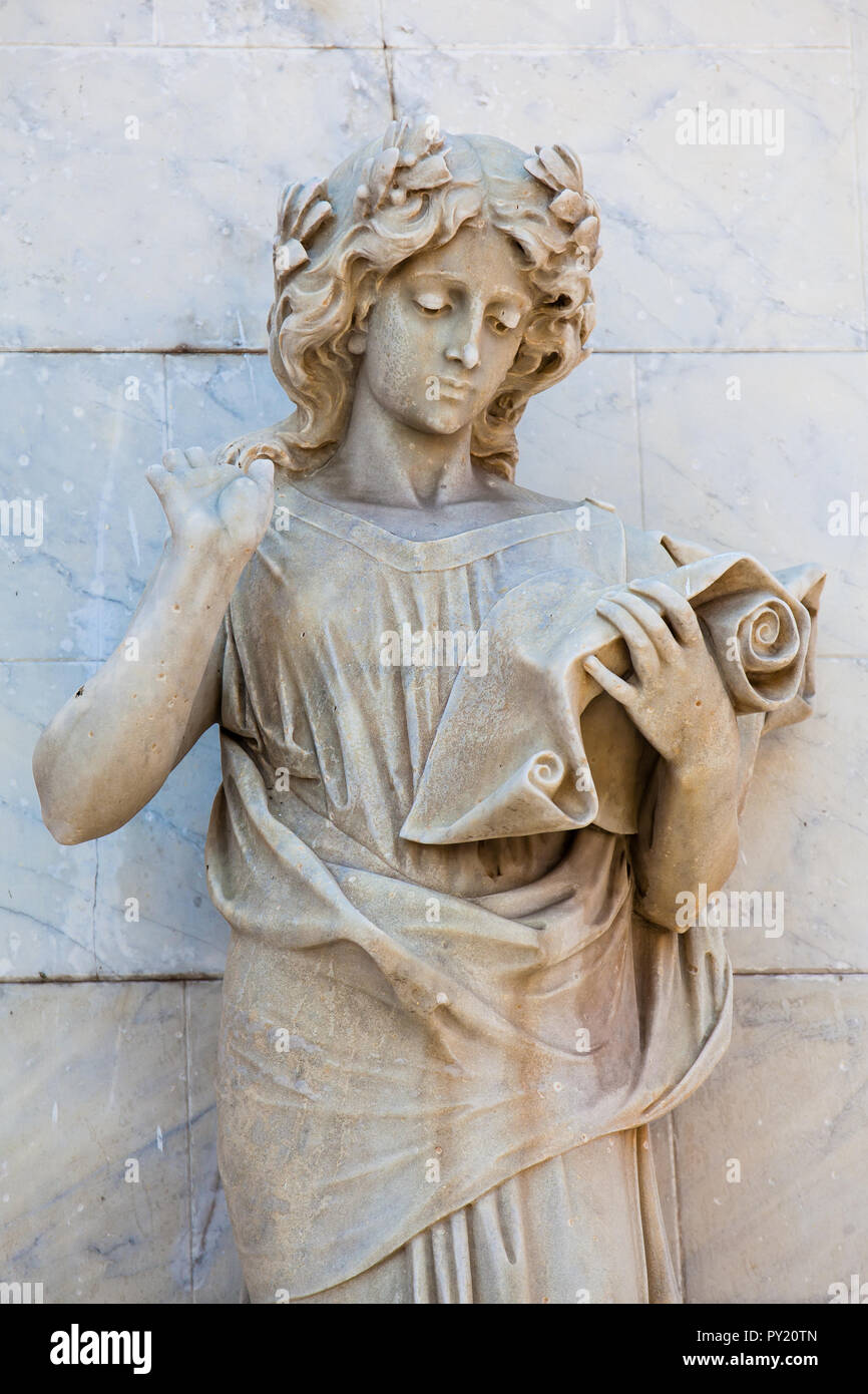 Calliope muse statue at the facade of the Adolfo Mejia theater in ...
