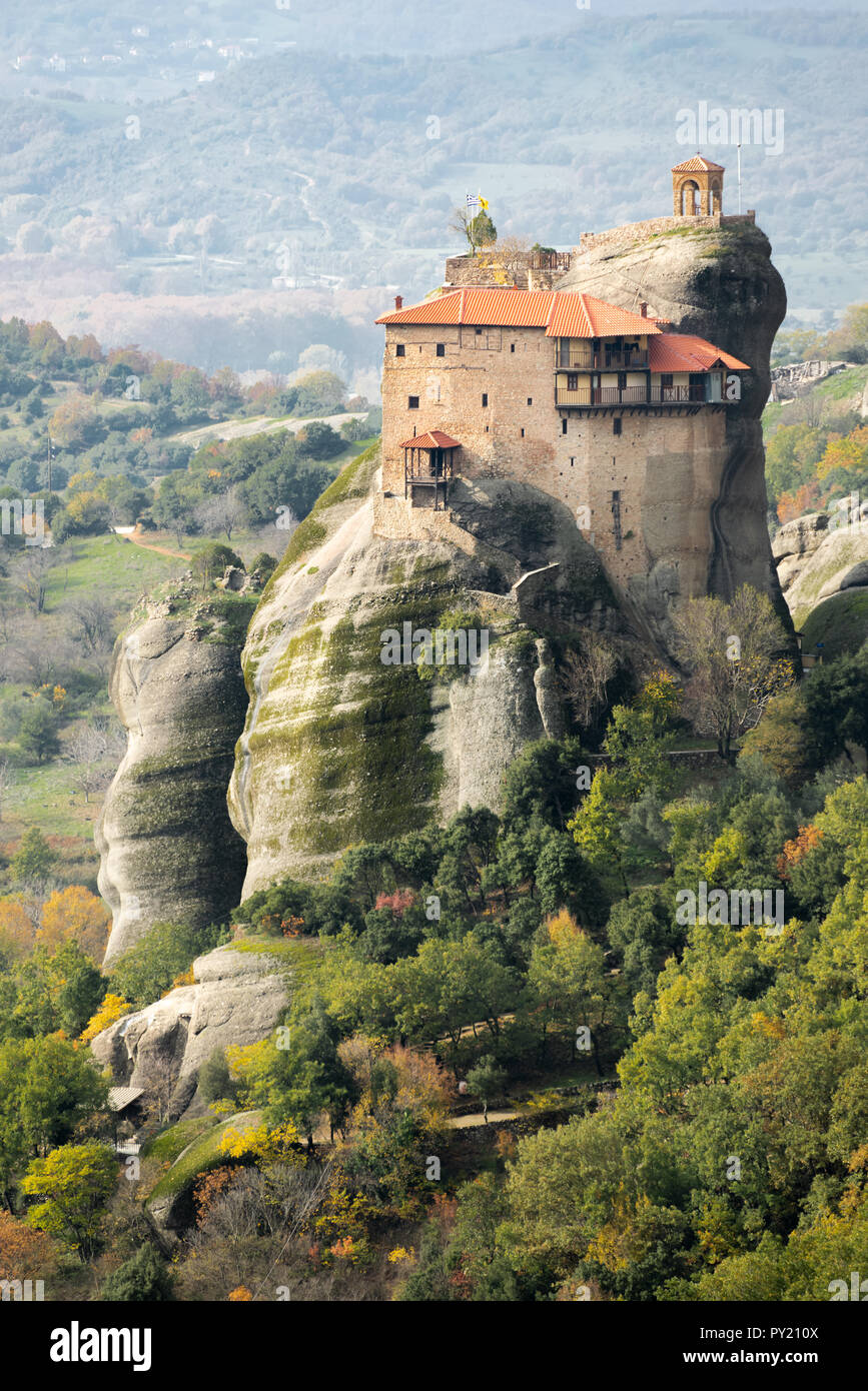 Meteora Greece a Monastery on top of a rocky cliff during sunset Stock ...
