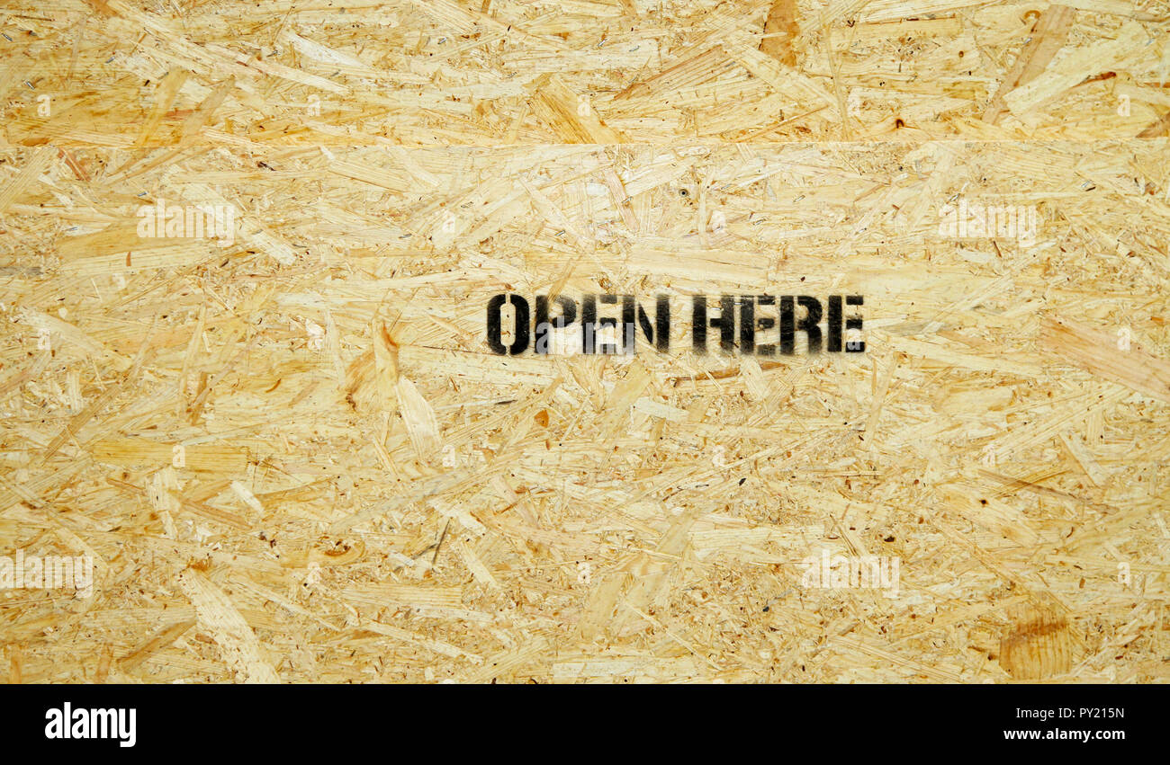 Open here sign at recycled wooden crate box Stock Photo - Alamy