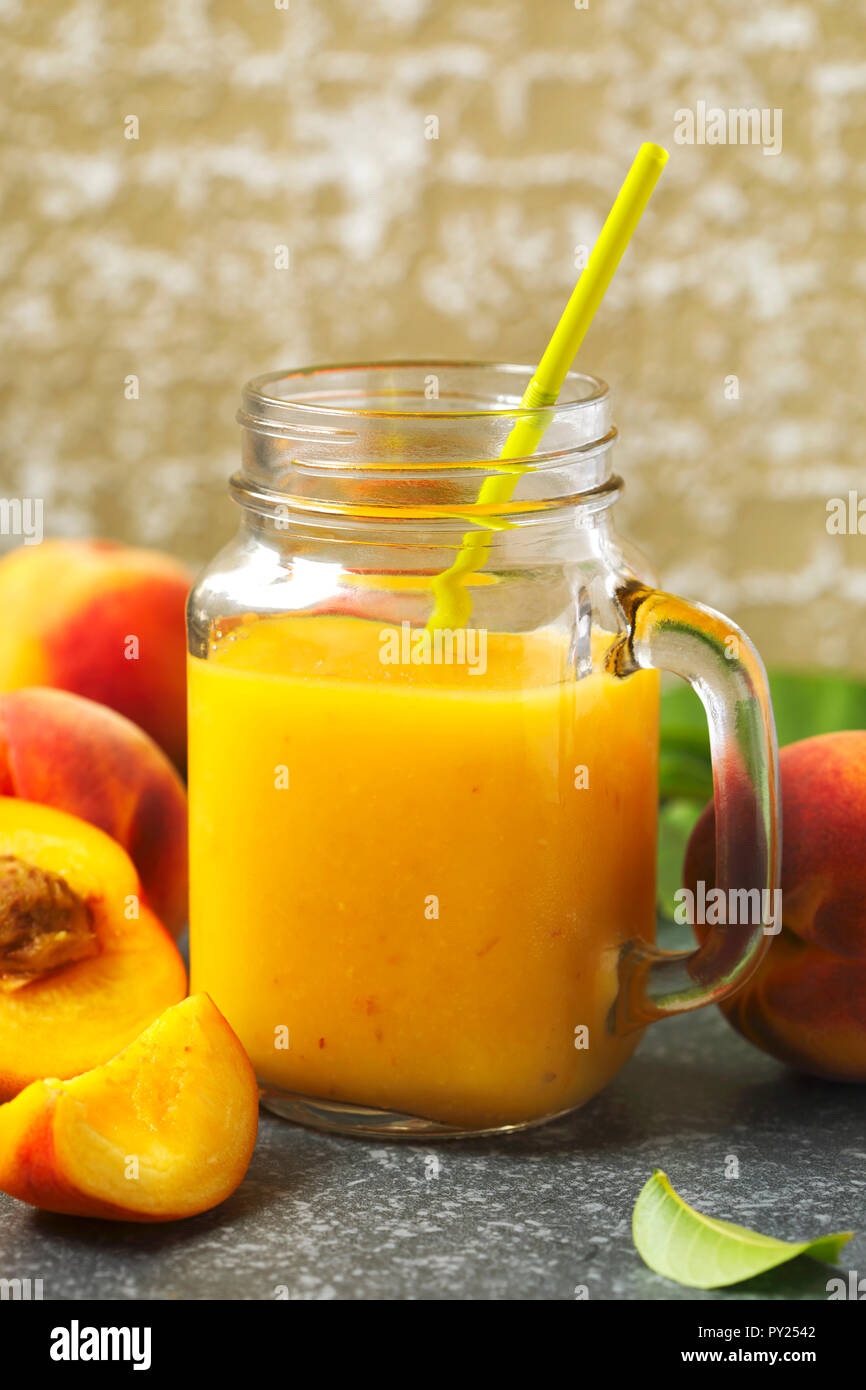 Peach juice in glass hi-res stock photography and images - Alamy