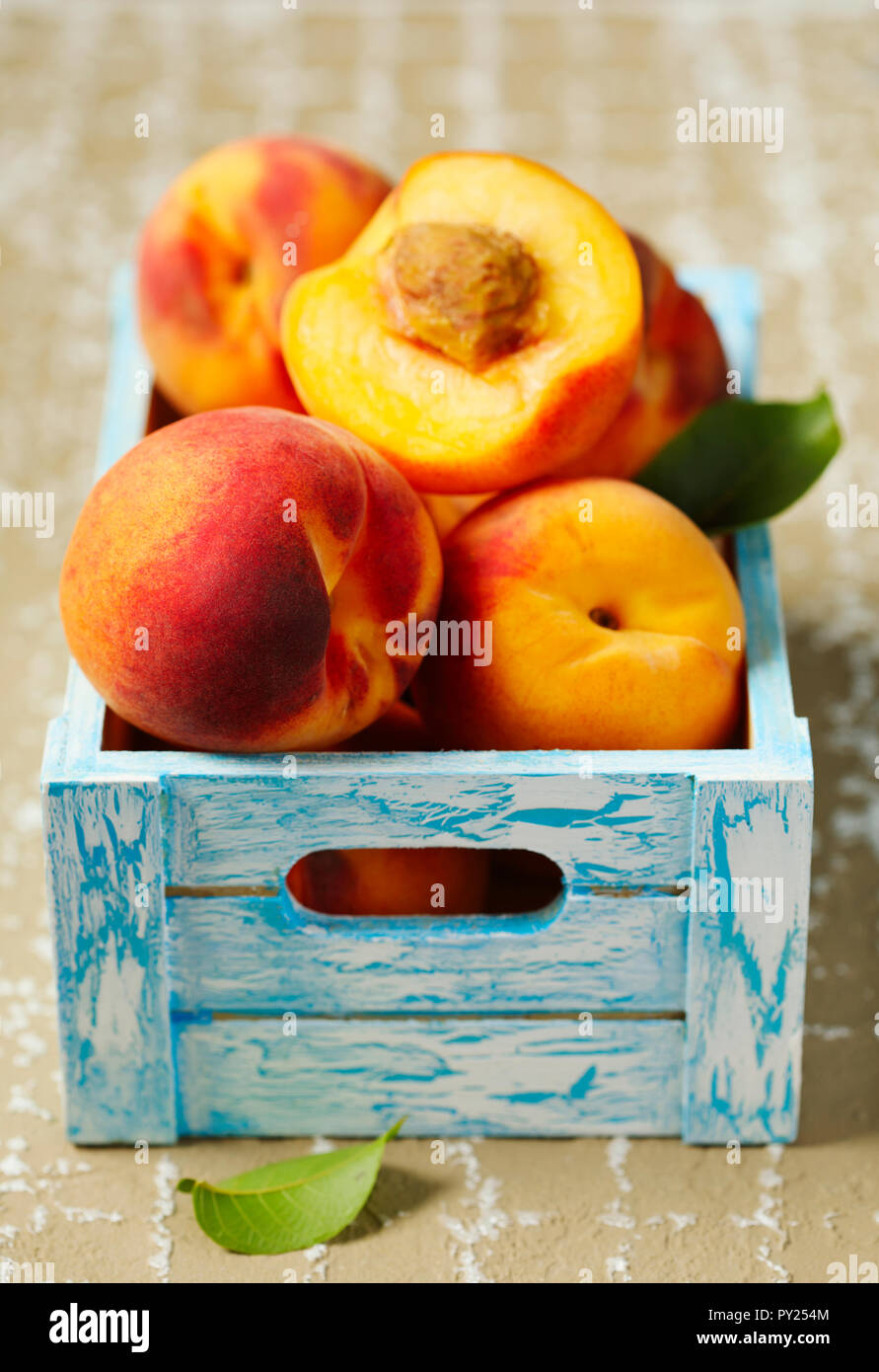 Sweet peaches in box hi-res stock photography and images - Alamy