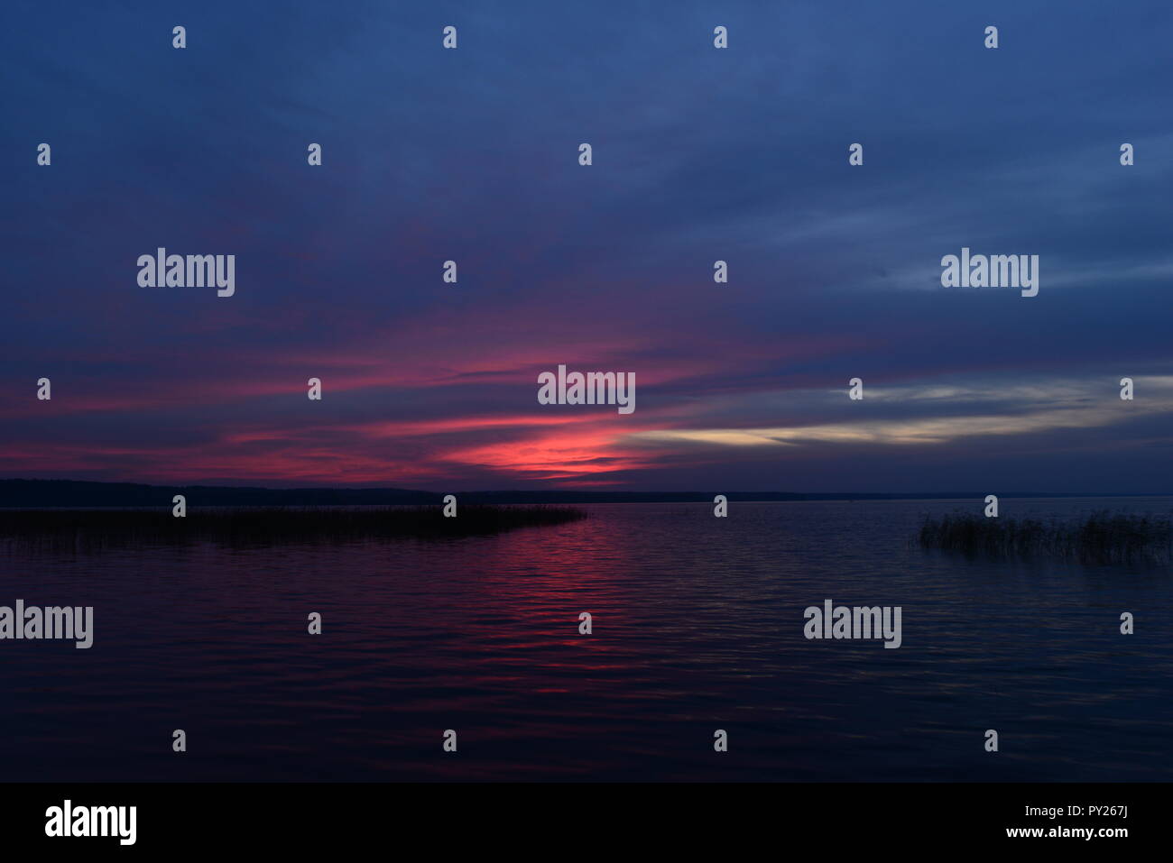 Gloomy blue sky nightfall in the last glow of twilight light over the ...