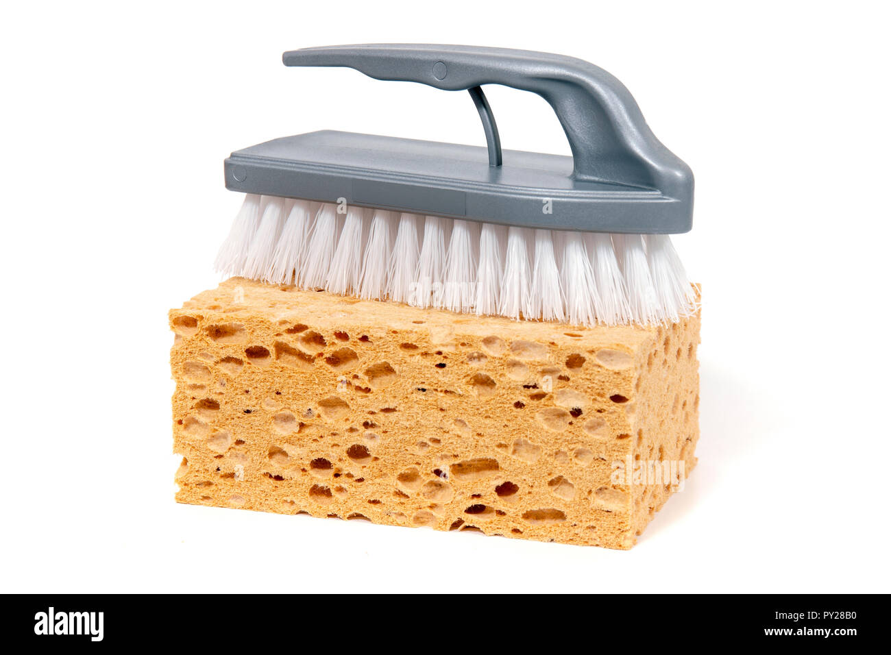 Big porous sponge with scrubbing brush isolated on white background ...