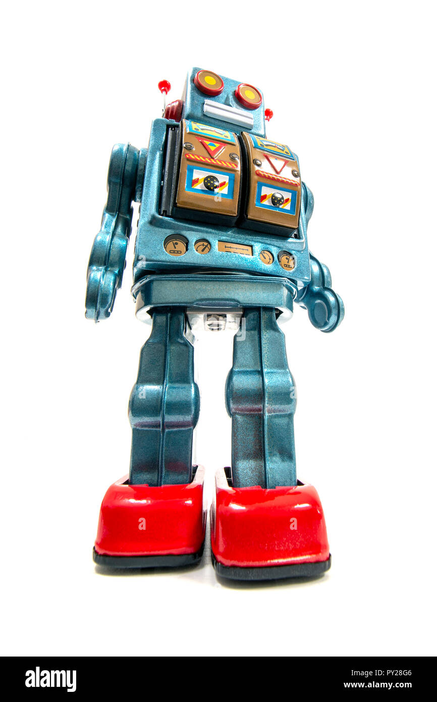 Vintage tin robot toy isolated on a white background Stock Photo - Alamy
