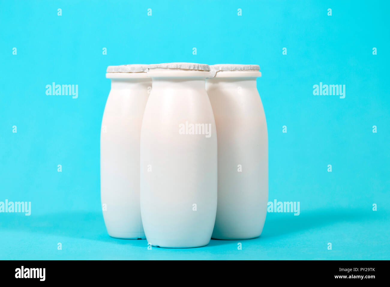 bottles of liquid yogurt isolated on a white background Stock Photo - Alamy