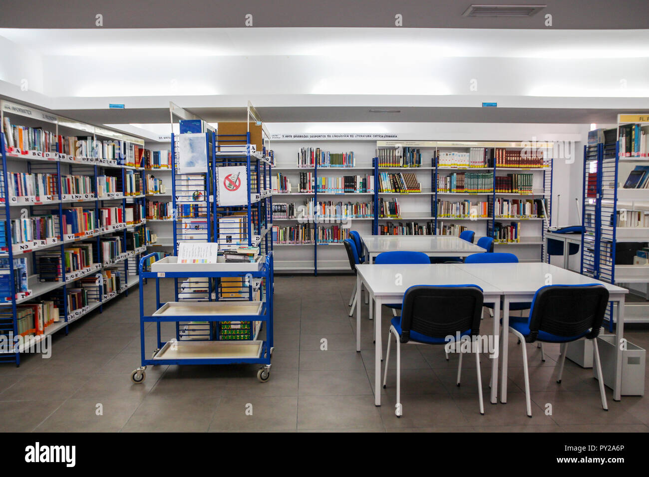 Interior view of a school library with books and table for study Stock ...