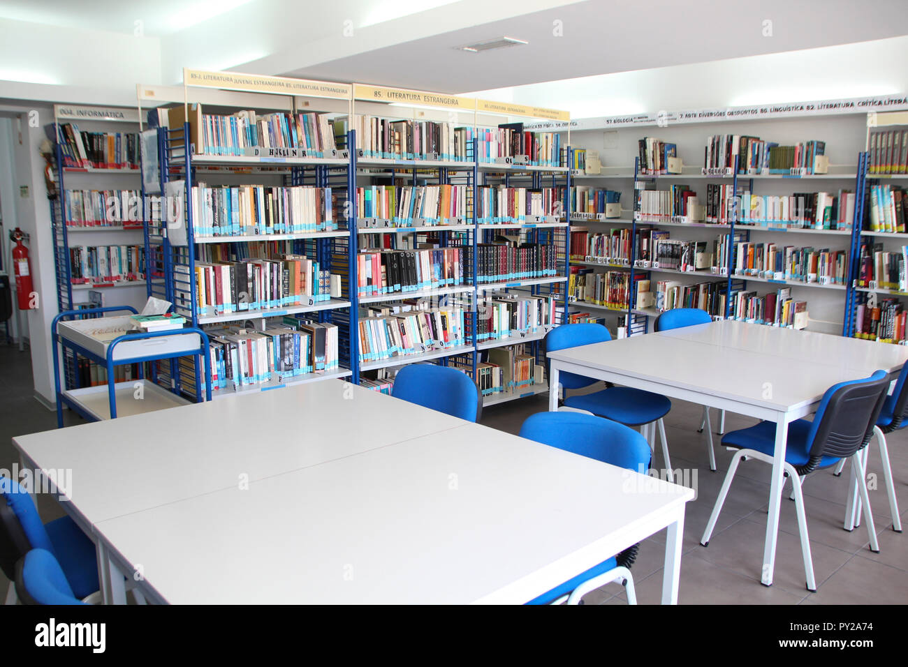 Interior view of a school library with books and table for study Stock ...