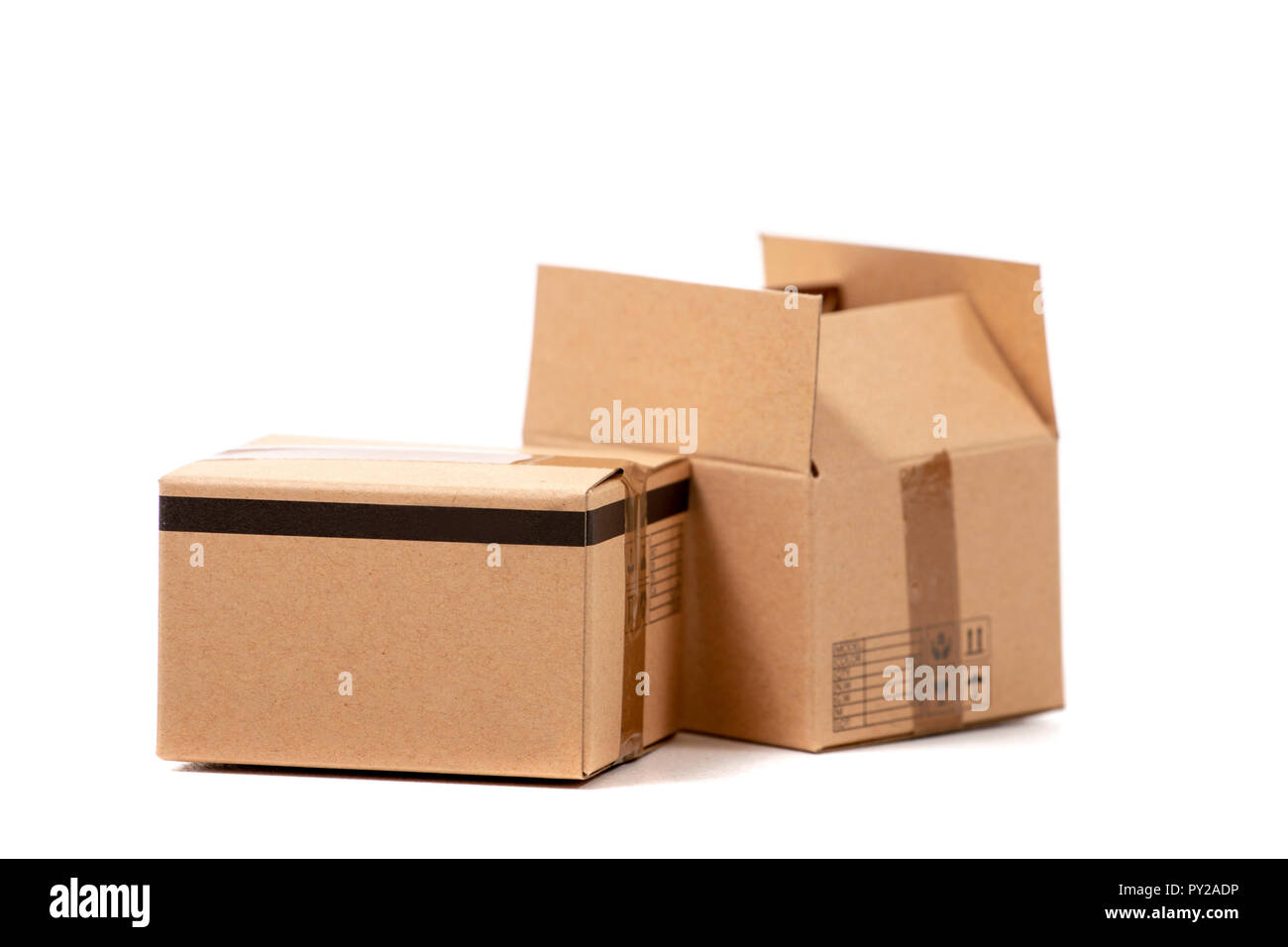 Classic cardboard box isolated over a white background Stock Photo - Alamy