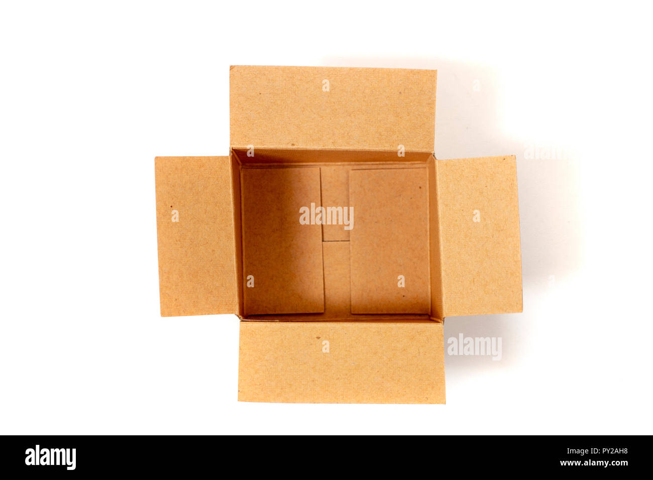 Classic cardboard box isolated over a white background Stock Photo - Alamy
