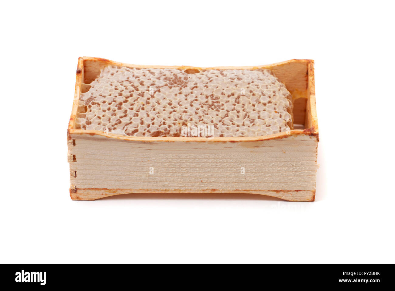 sweet honeycomb crate isolated on a white background Stock Photo - Alamy