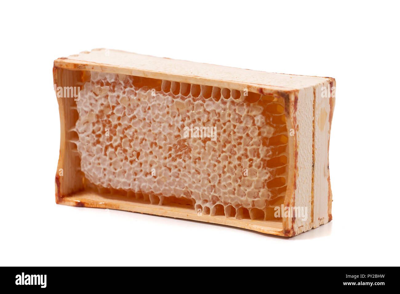 sweet honeycomb crate isolated on a white background Stock Photo - Alamy