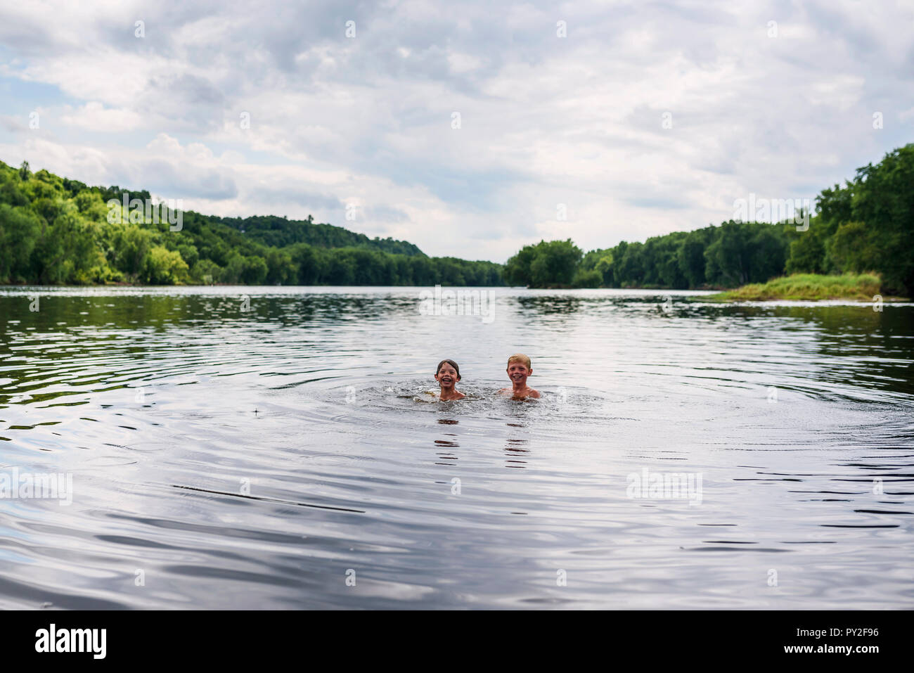 Two boys playing river hi-res stock photography and images - Alamy