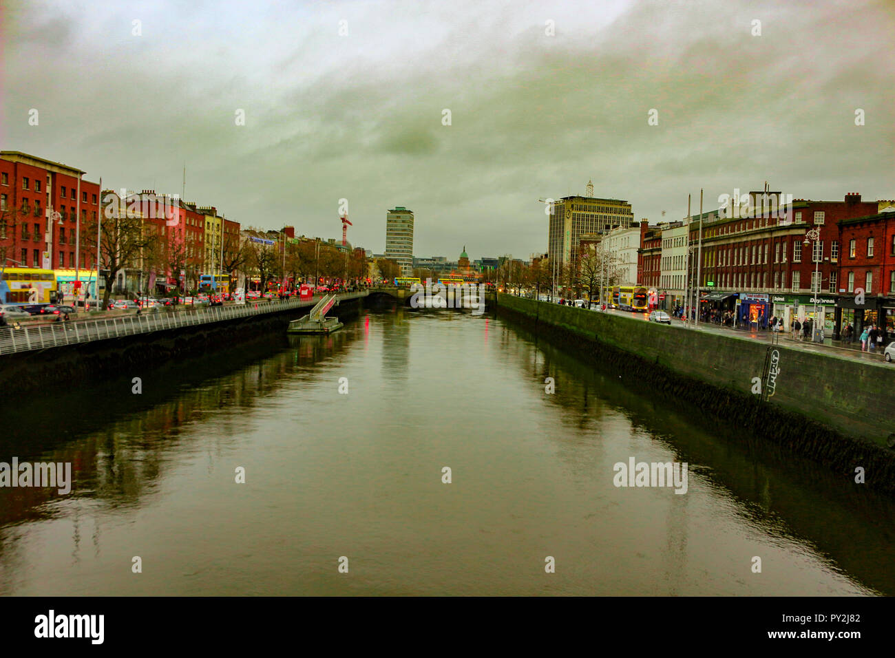 View of the Dublin canal from the bridge, beautiful Dublin downtown ...