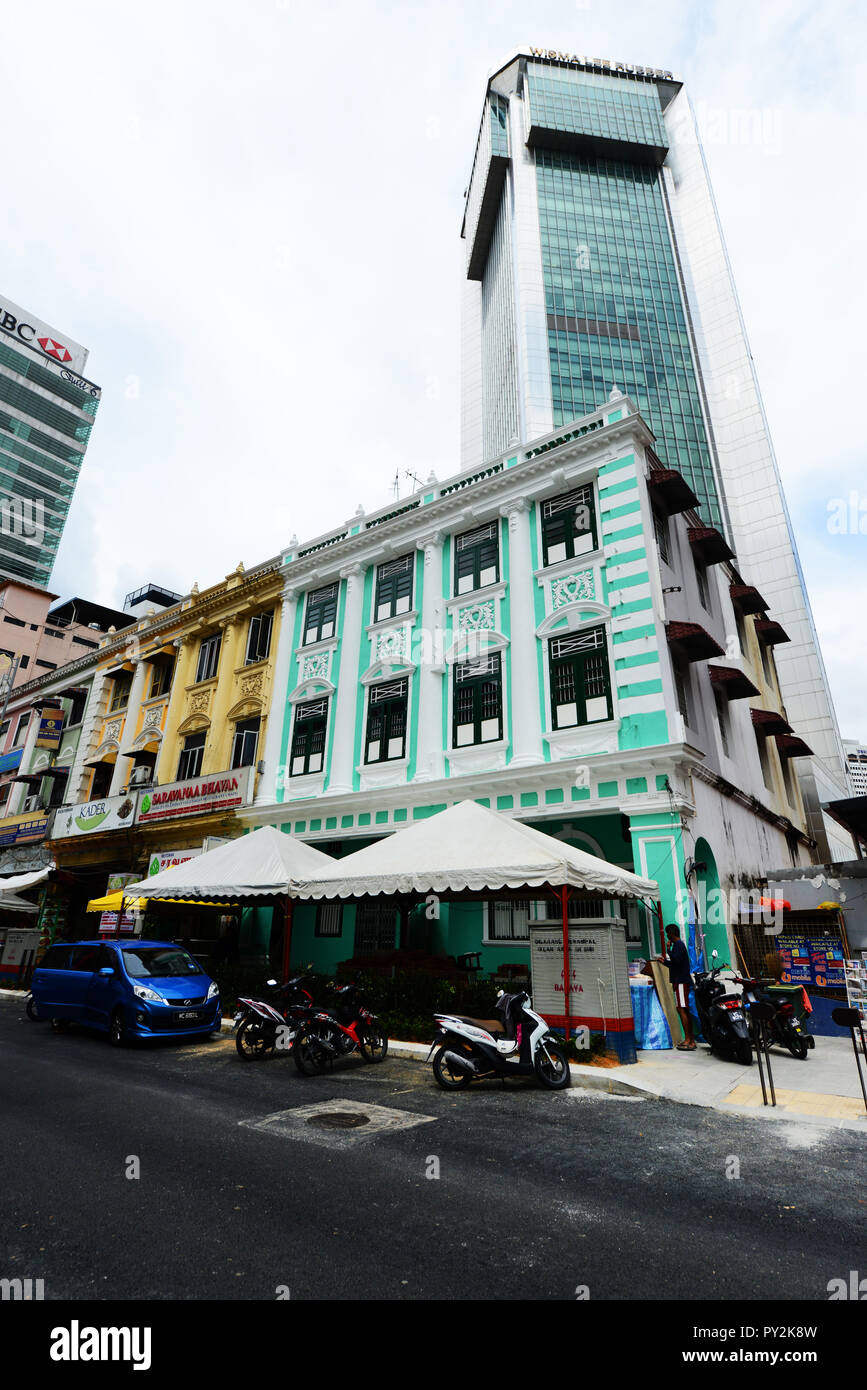 Beautiful old colonial buildings on Leboh Ampang street with a modern ...