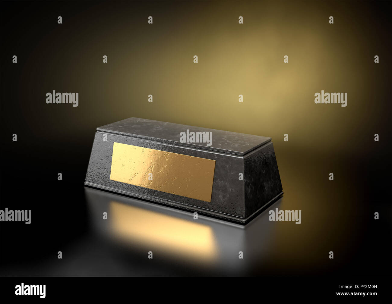 An empty black marble trophy base with a blank golden plaque on an ...
