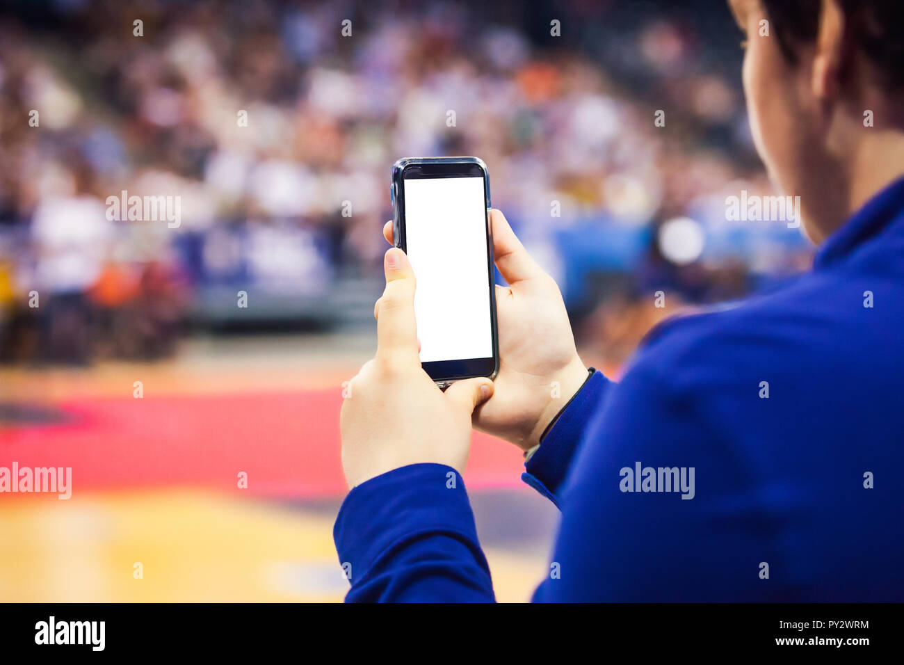 Crowd using cell phone hi-res stock photography and images - Alamy