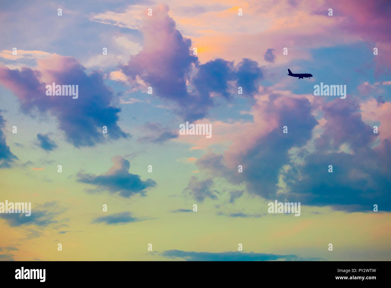 Distant plane after takeoff Stock Photo - Alamy